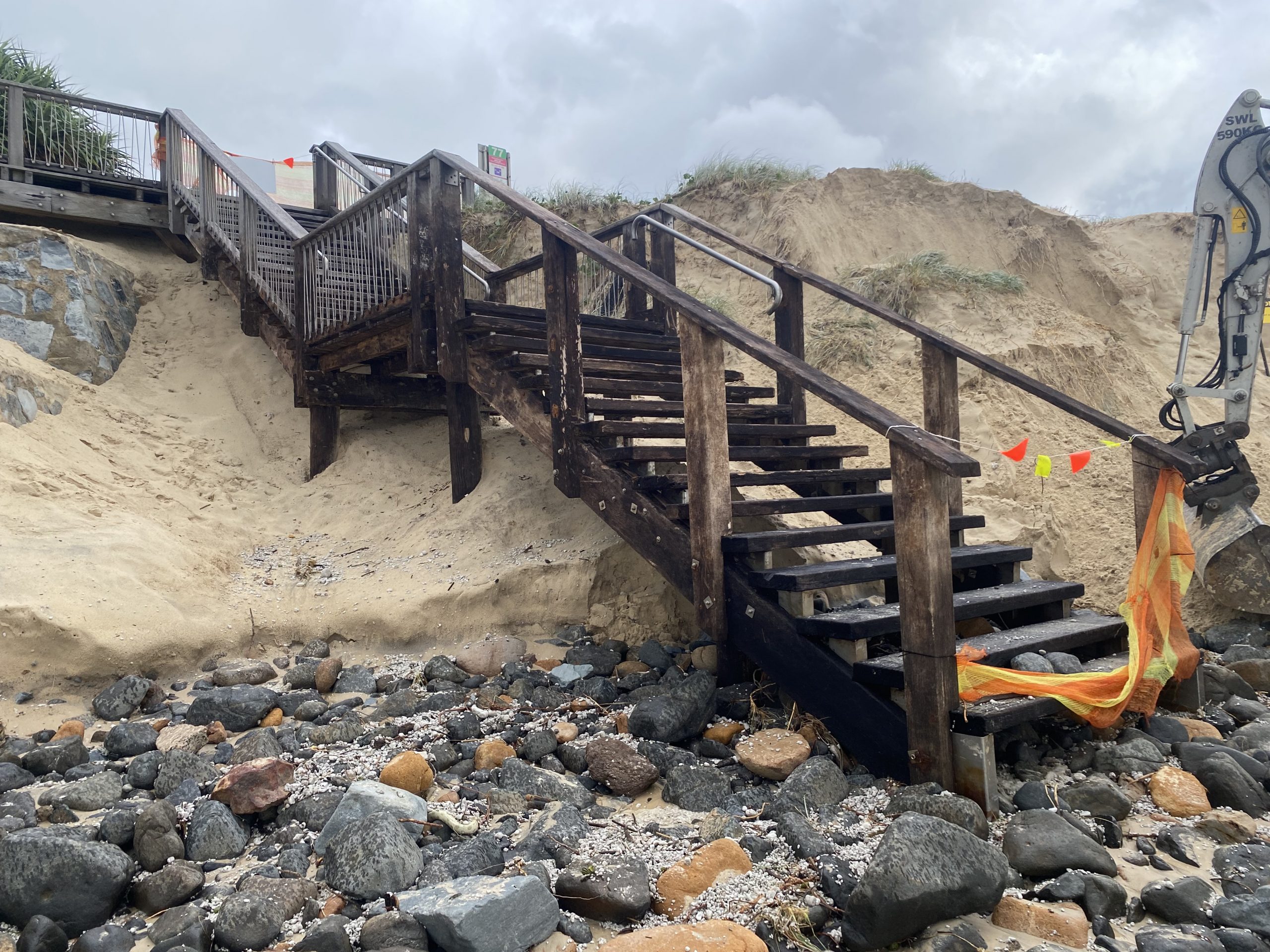 A step up for badly damaged access to Coolum beach