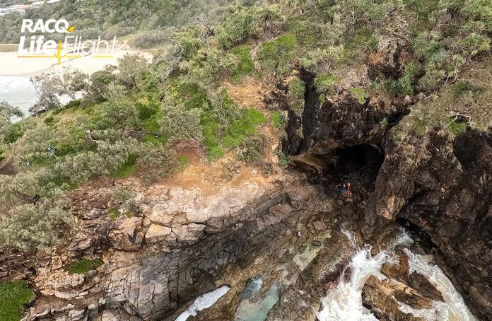 Woman winched out after falling down cliff