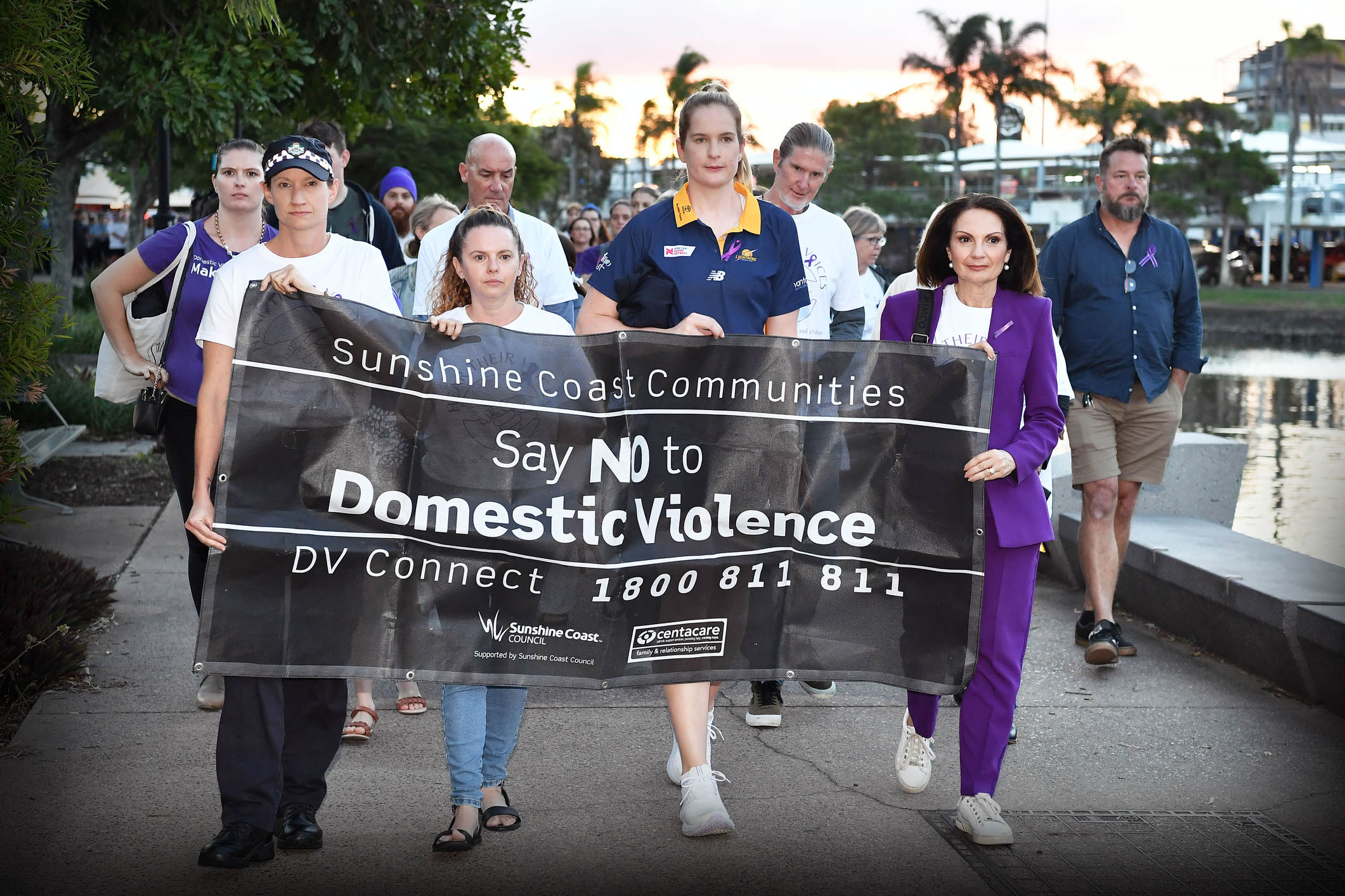 Vigil and march held for domestic violence prevention month