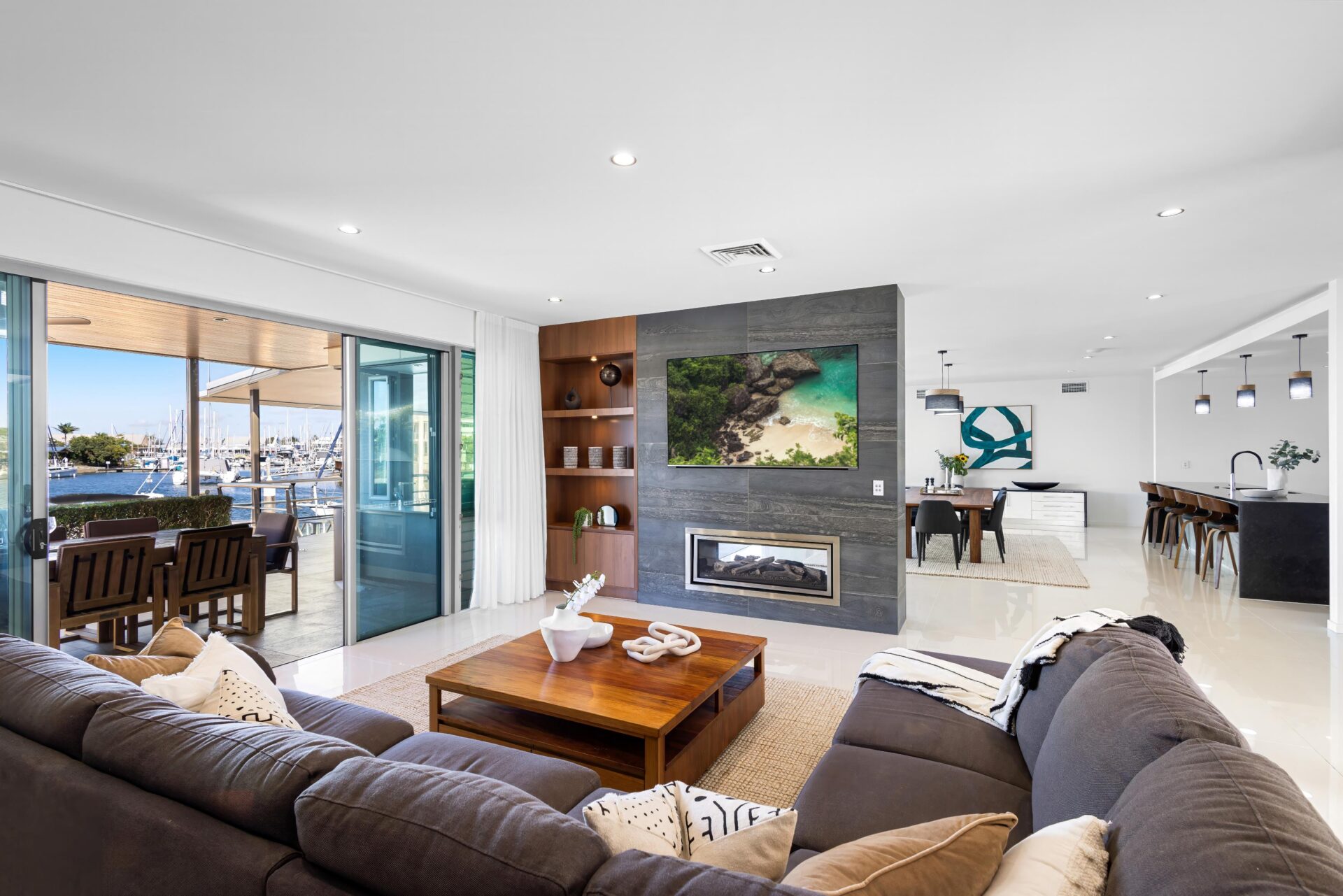 Renovated waterfront residence offers rare oversized pontoon