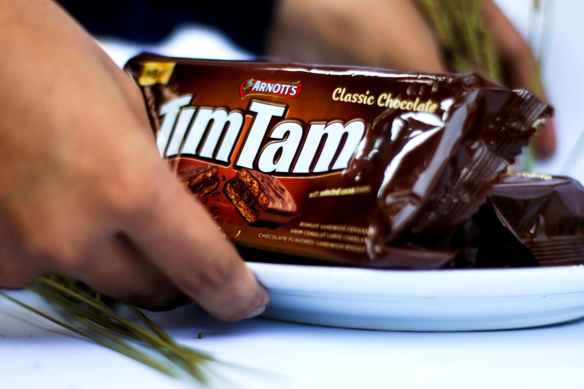 Supermarkets tight-lipped on Tim Tam price discrepancy