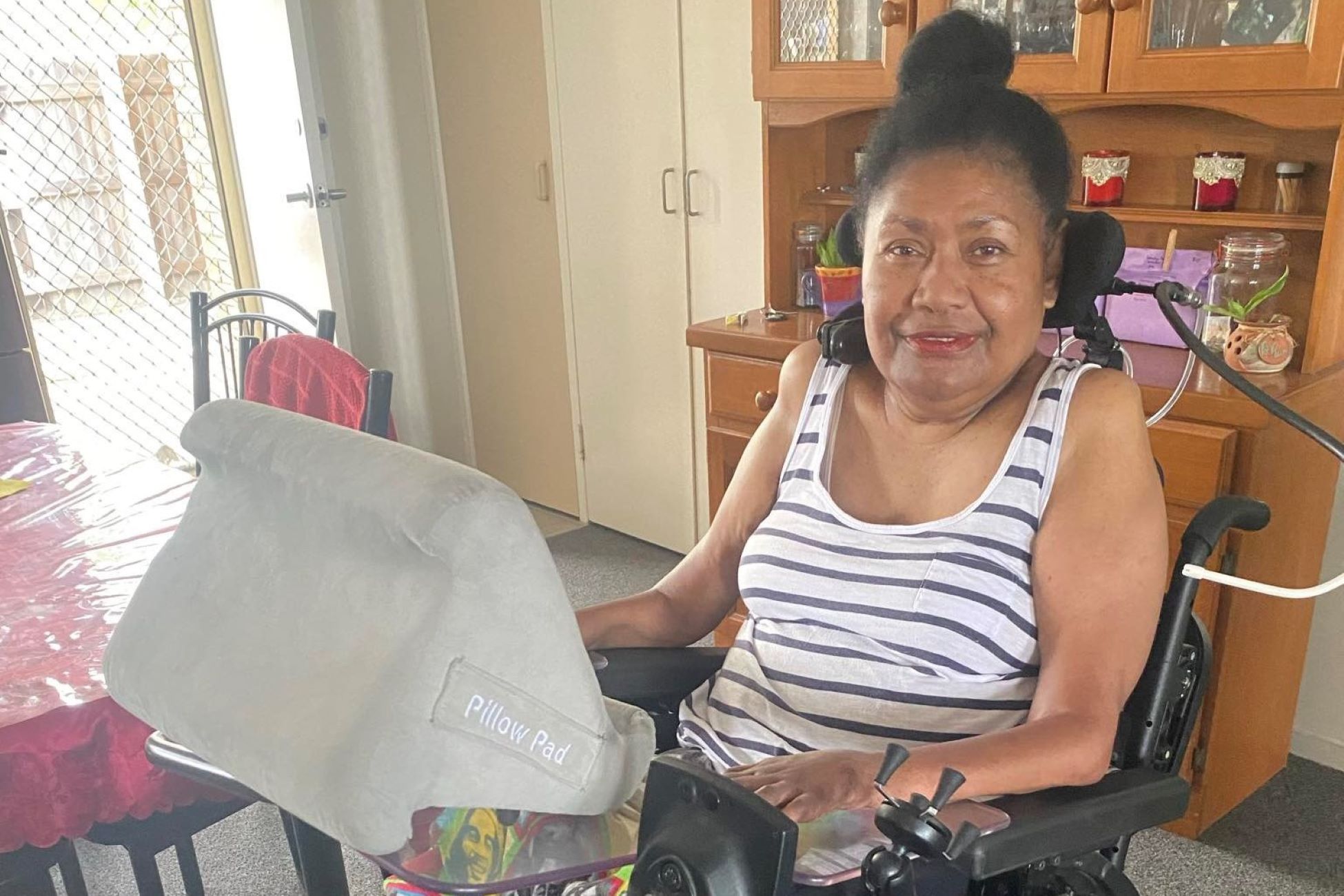 Woman seeks help to see family while she still can