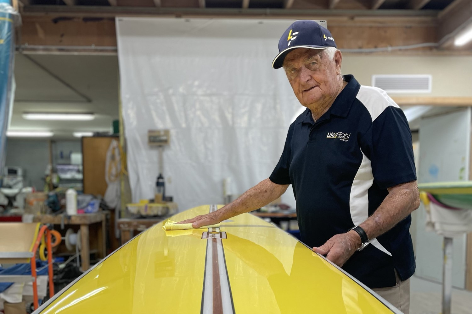 Surf sports icon donates collector board for fundraiser