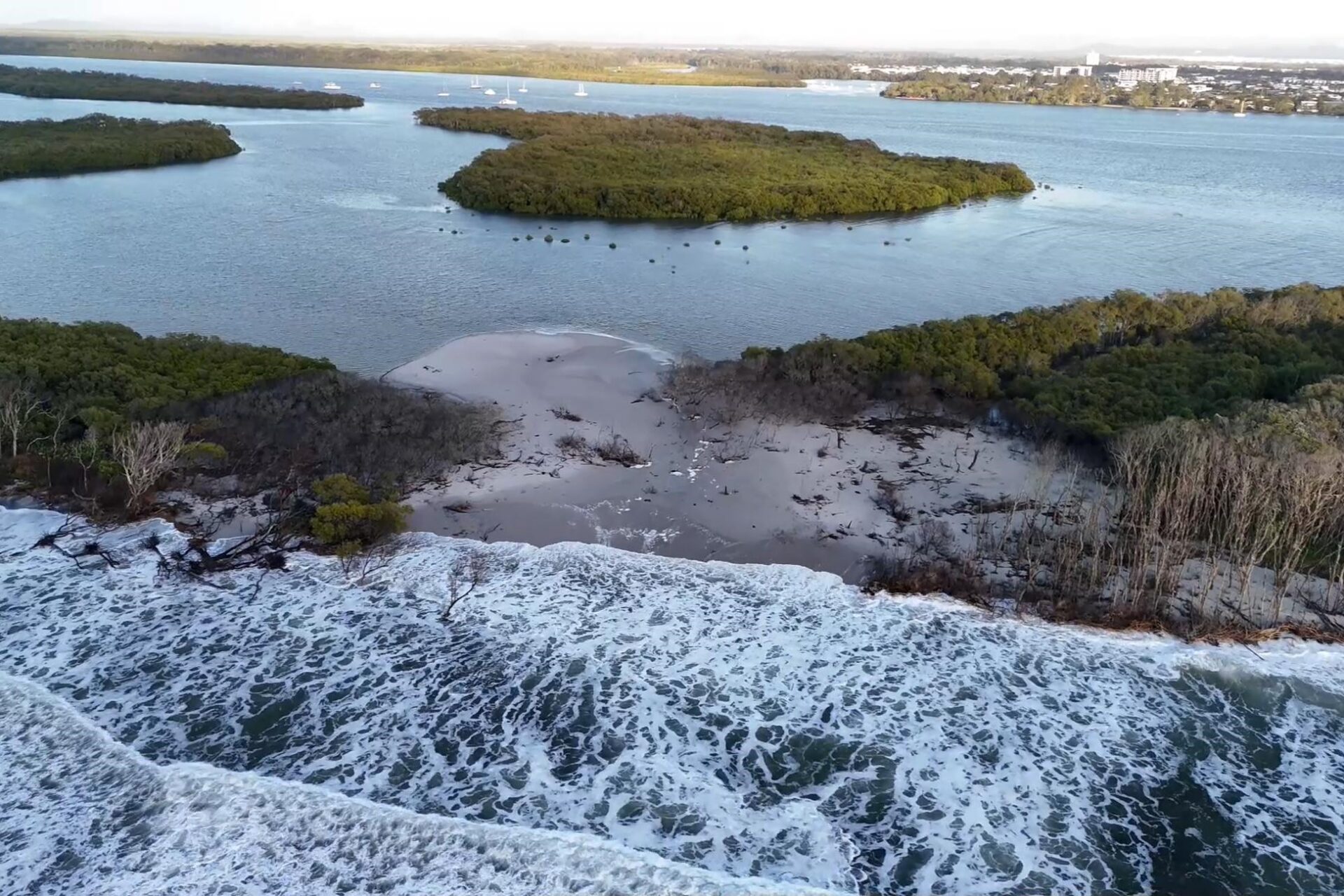 Ocean threatens to split island again