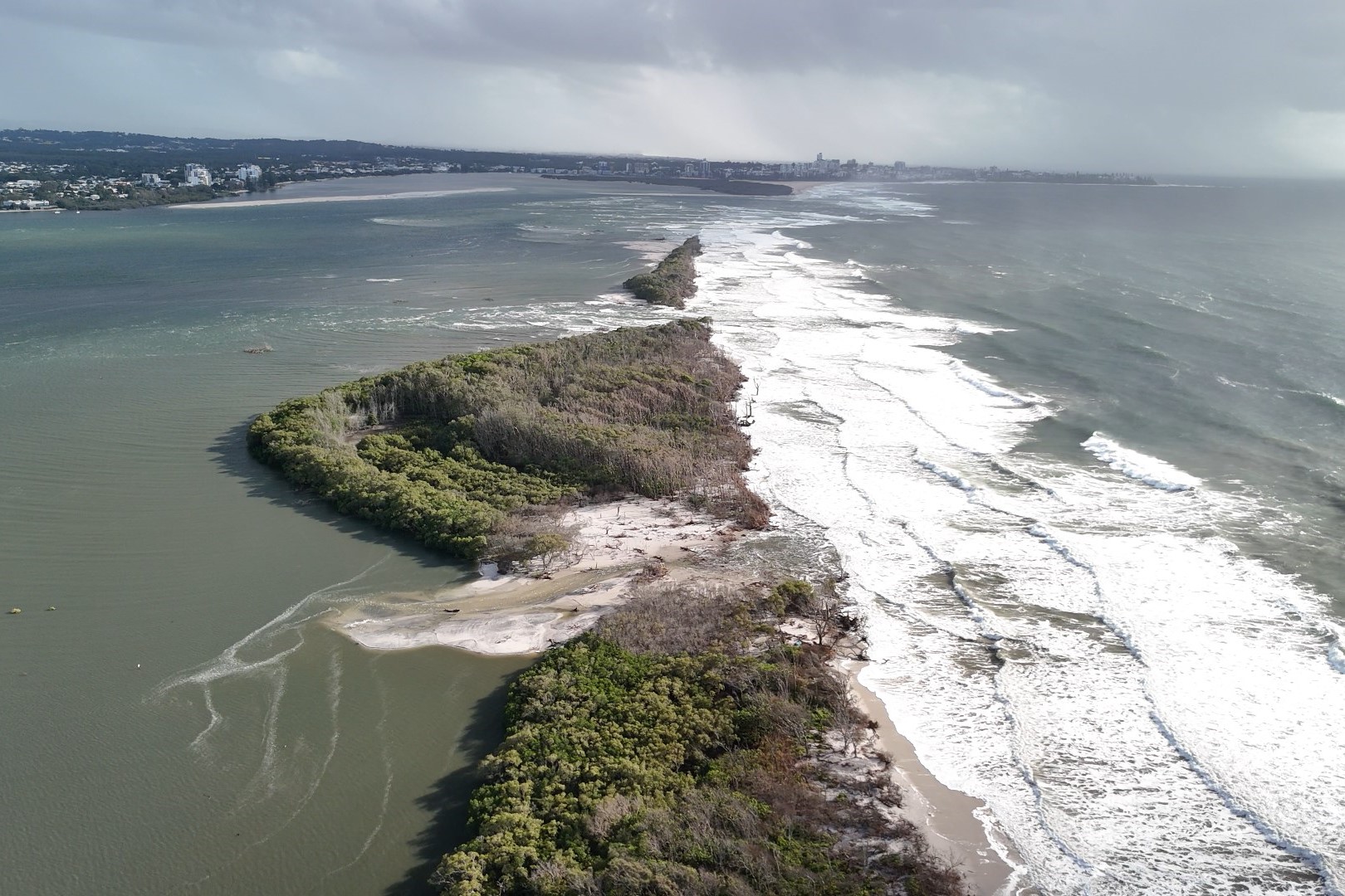 Ocean threatens to split island again