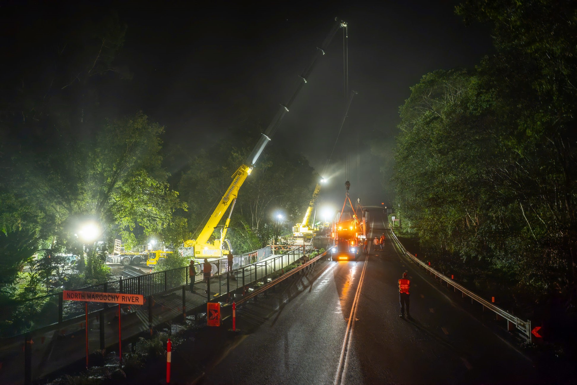 Bridge lifted into place in big step for pedestrian project