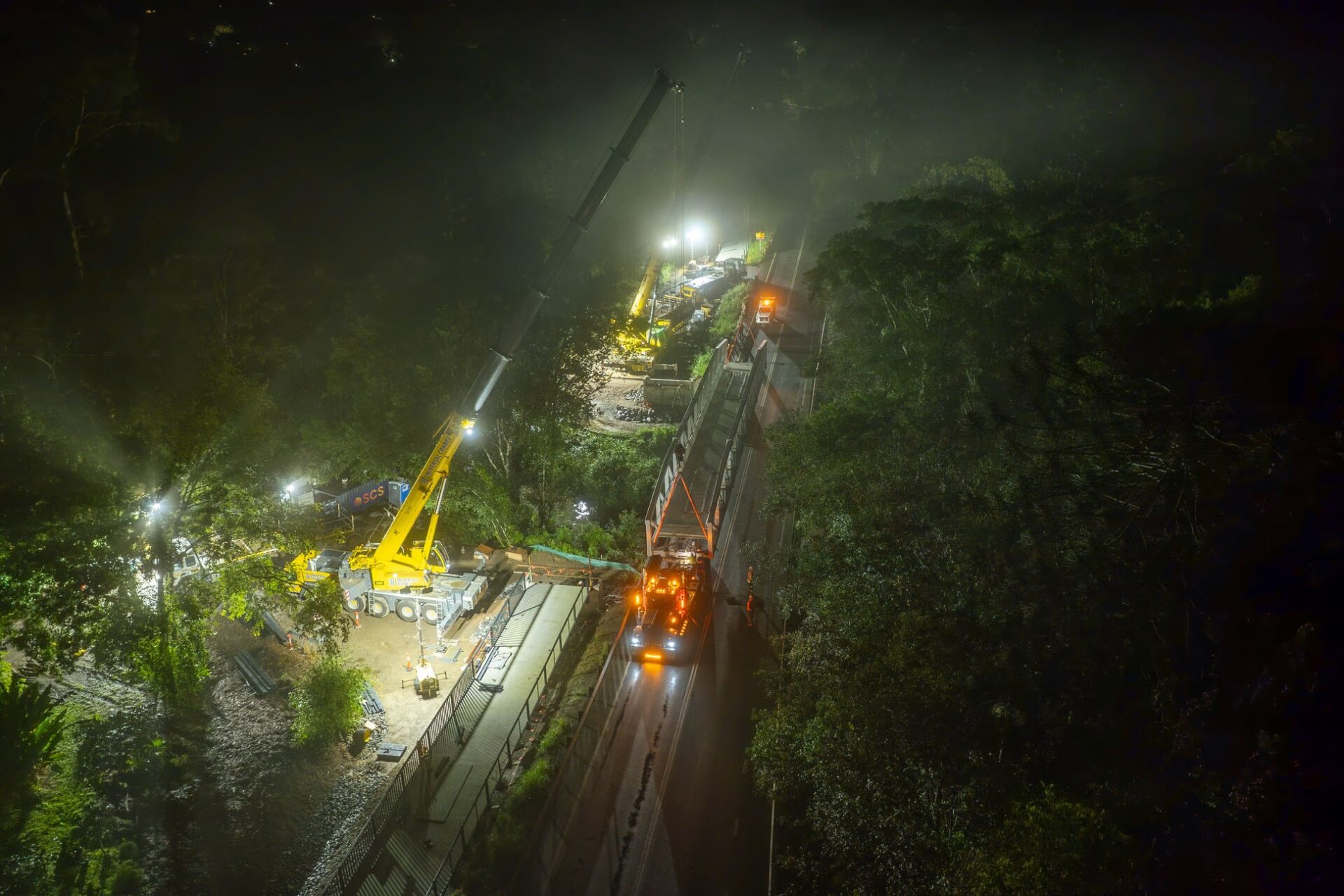 Bridge lifted into place in big step for pedestrian project