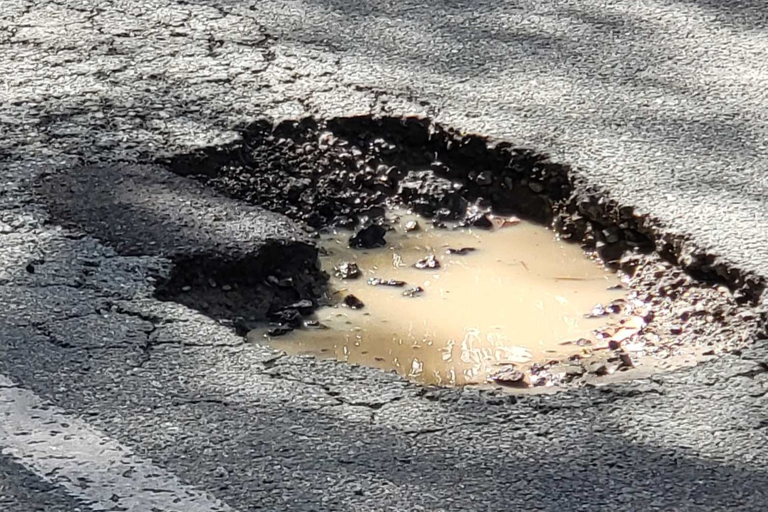 Tyred and tested: pothole saga leaves driver deflated