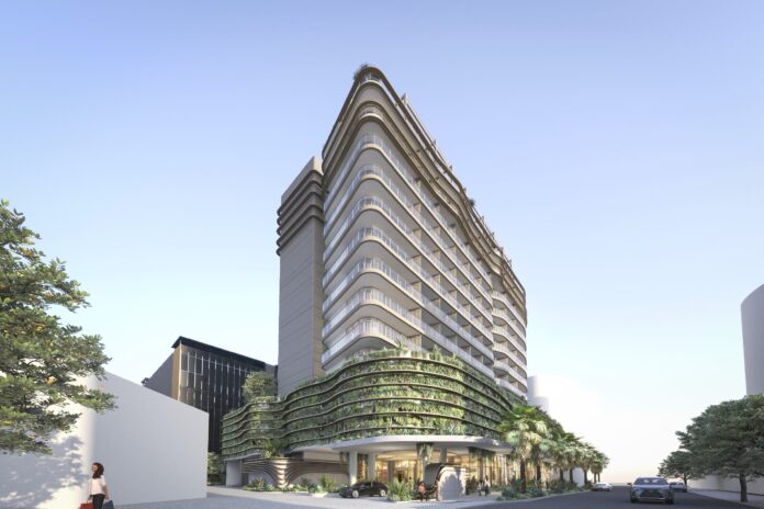 Coast’s first full-service hotel in 30 years tops out